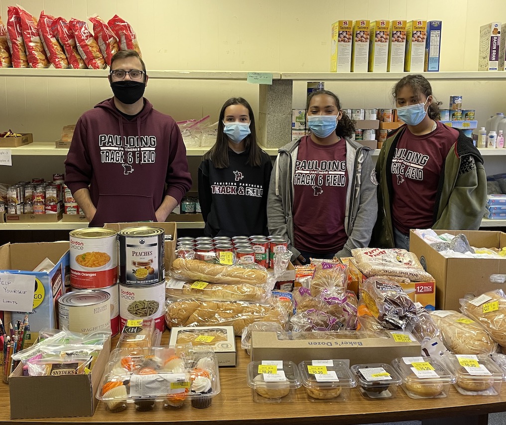 PMS Track Team Volunteer at Food Pantry | West Bend News